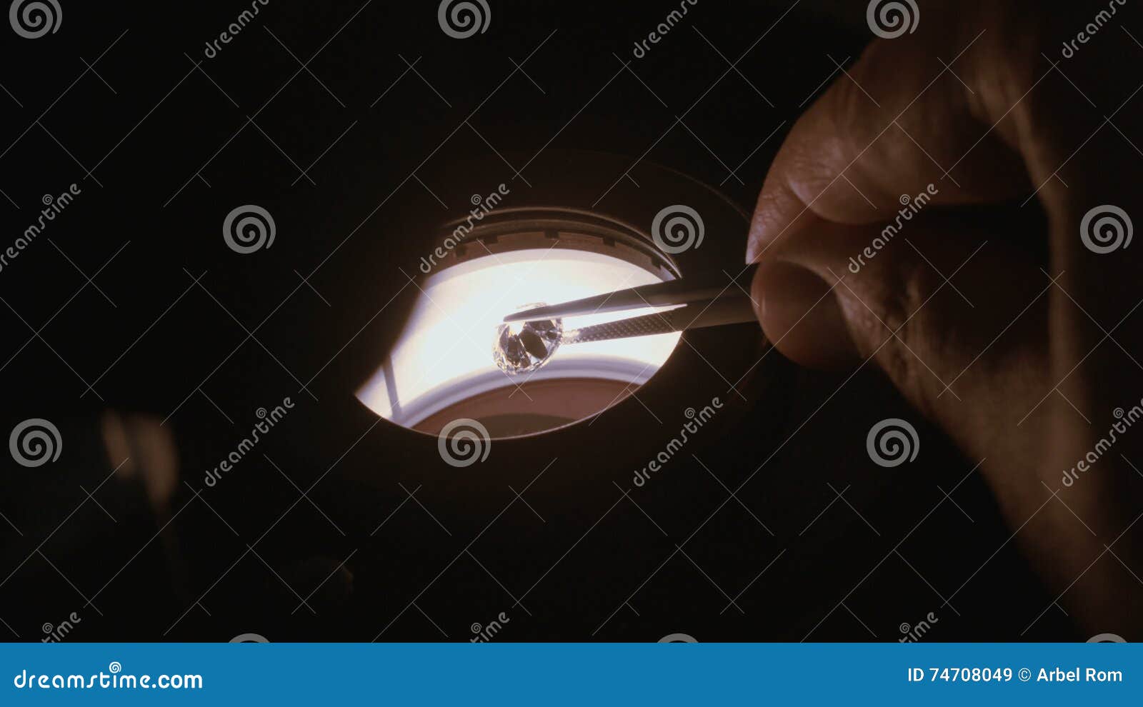 A Gemologist Inspecting a Large Diamond Under a Microscope Stock Video ...