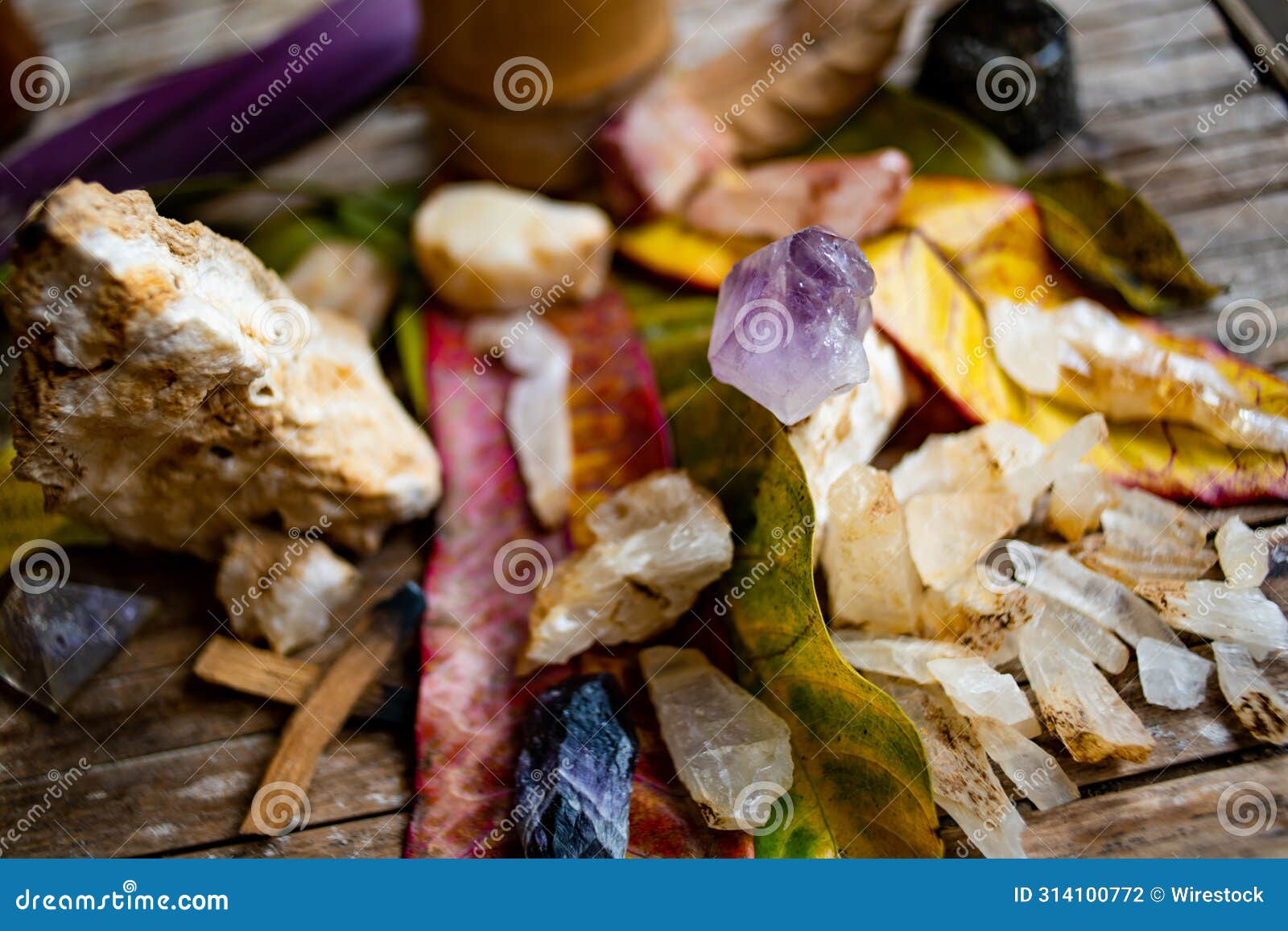 Gemstones and Crystals Displayed on a Plate Atop a Table Stock Photo ...