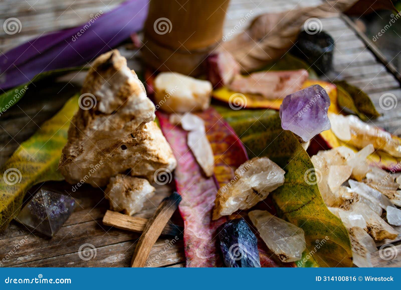 Gemstones and Crystals Displayed on a Plate Atop a Table Stock Photo ...