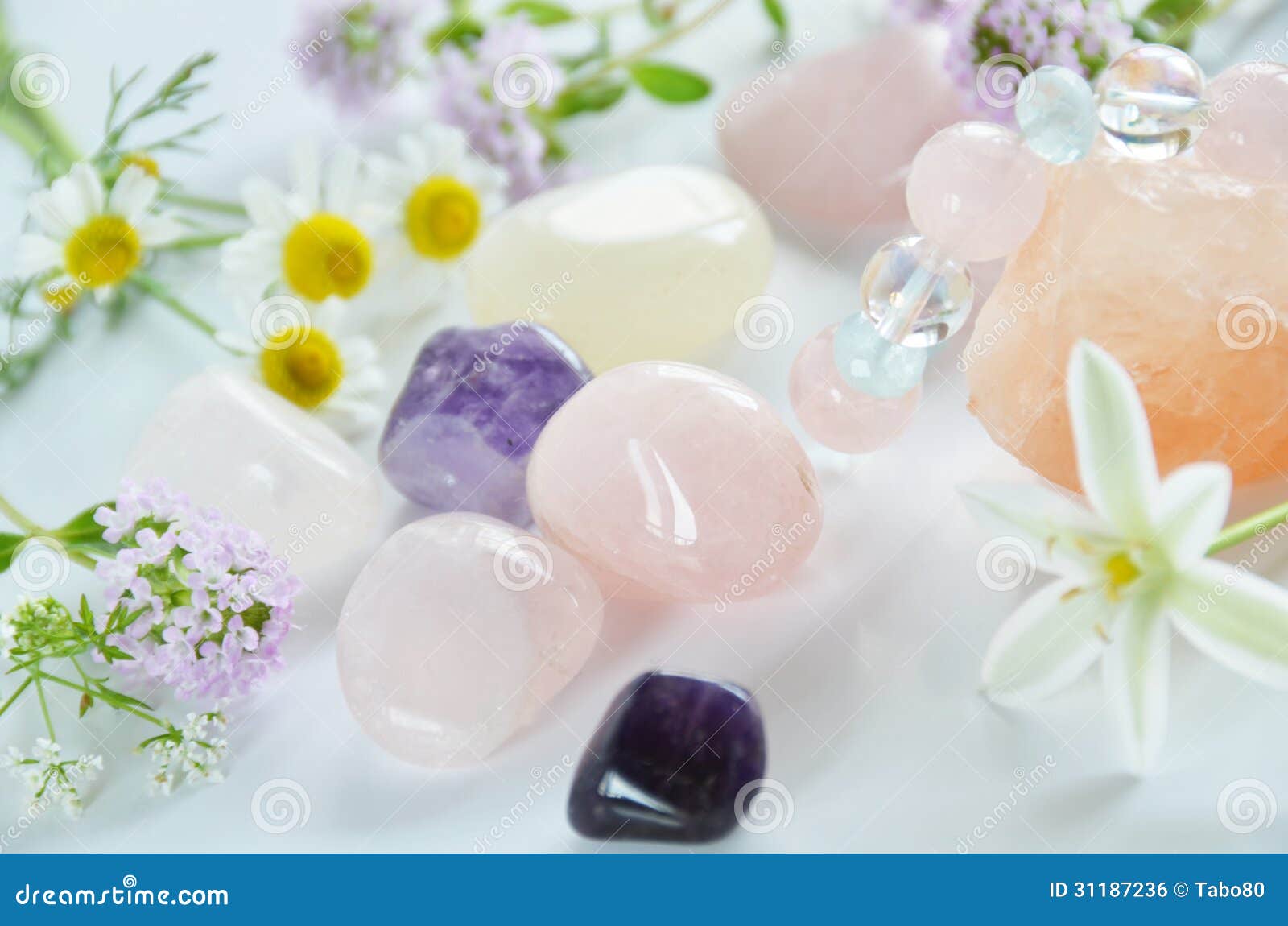 Gemstones with flowers stock photo. Image of spirituality - 31187236