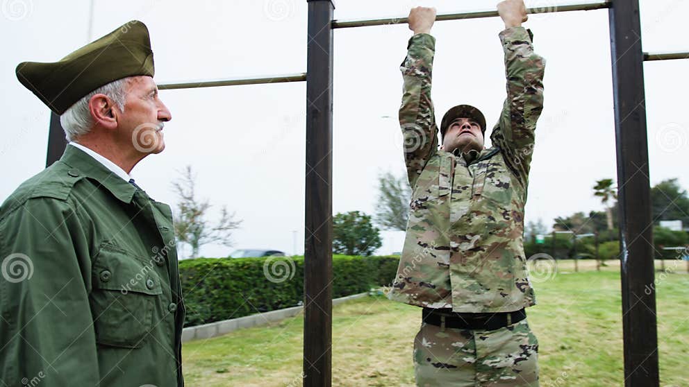 General Checks the Physical Test of the Military Cadet with Pull-ups ...