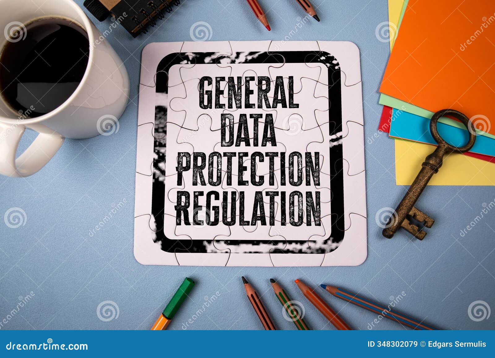 General Data Protection Regulation. White Puzzle and Office Supplies on ...