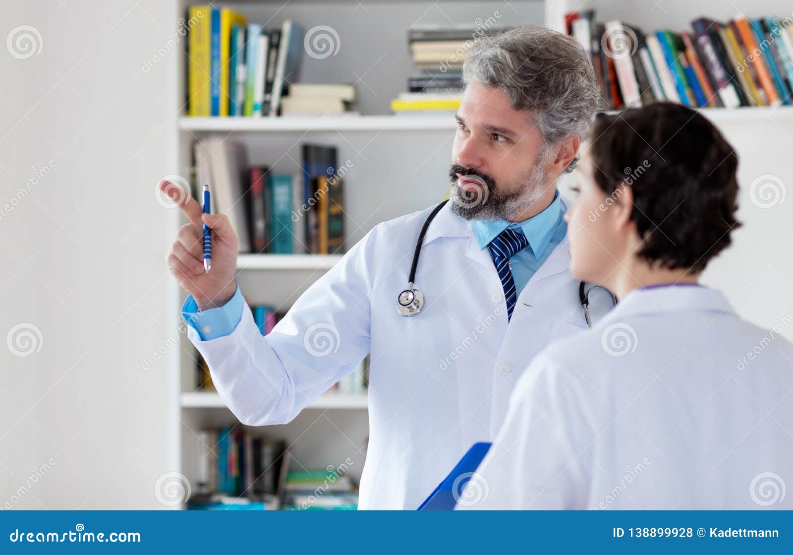 General Practitioner Talking with Medical Student about Therapy of ...