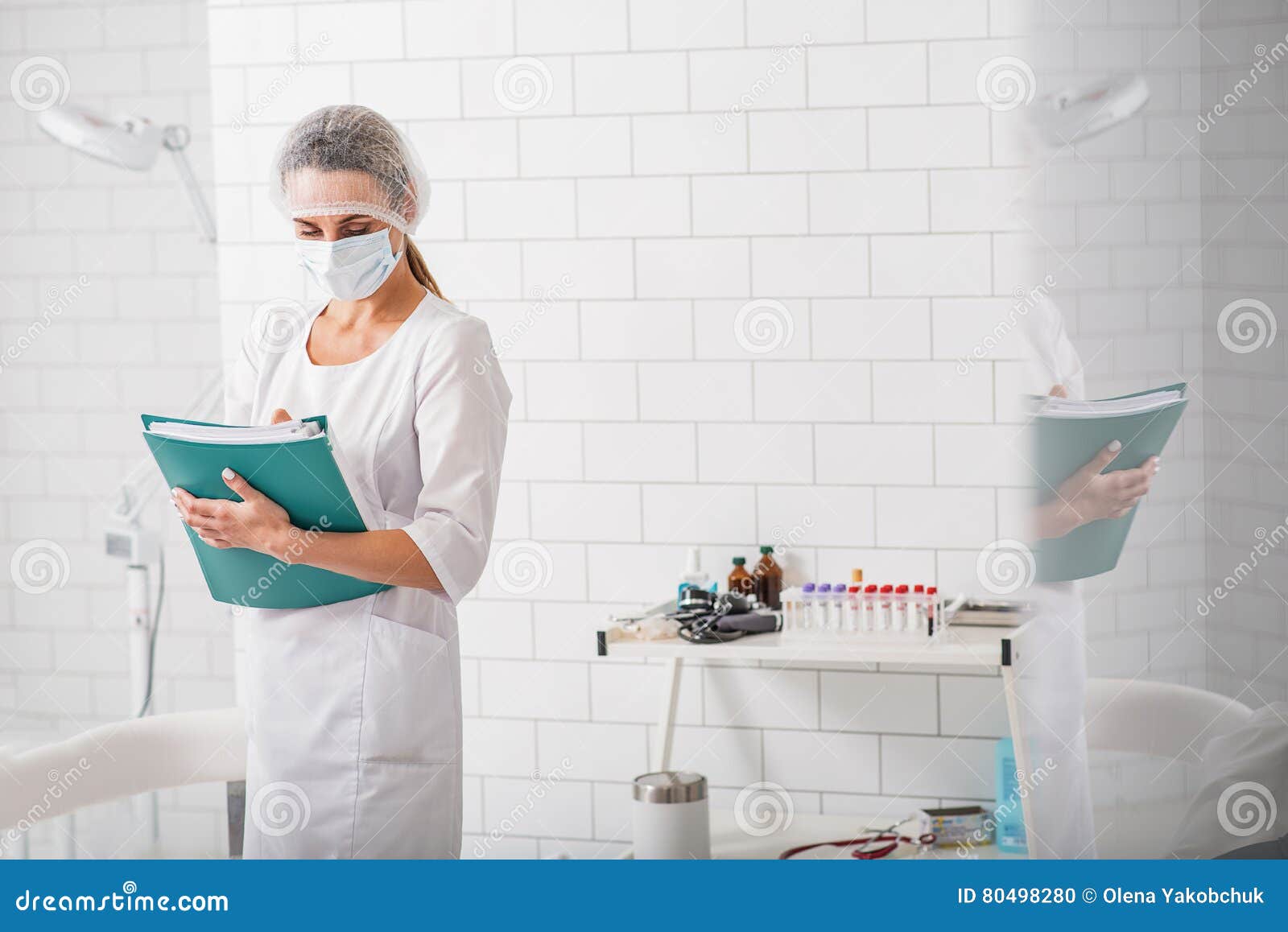 General Practitioner Writing Diagnosis in Clinic Stock Photo - Image of ...