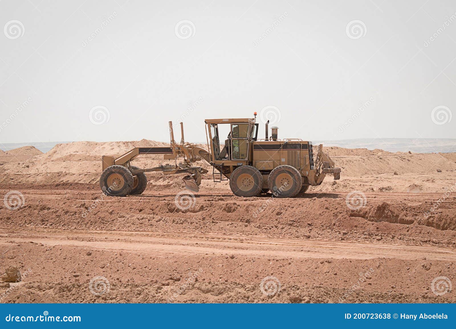 Grader Making Earthwork in a Construction Site Stock Photo - Image of ...