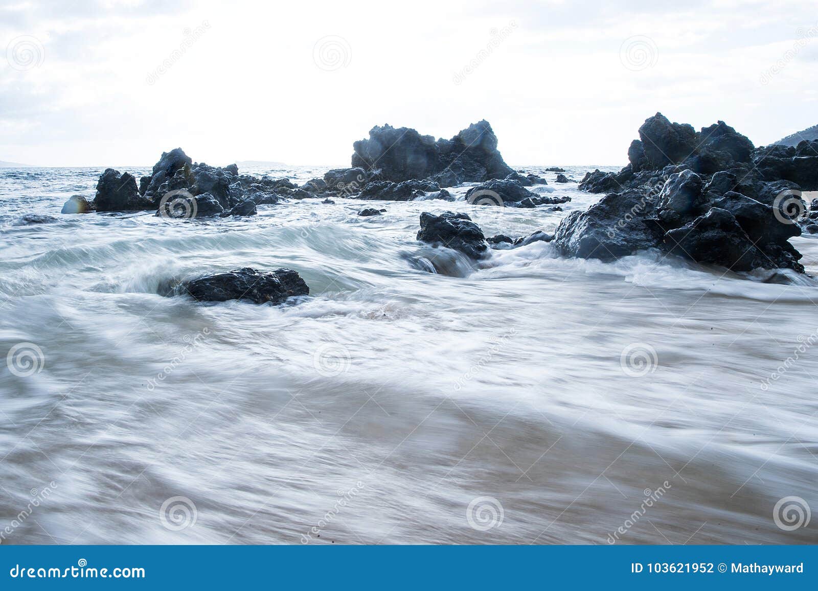 Powerful Ocean Current Rushing in To Beach Stock Photo - Image of ...