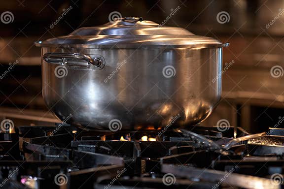 Big Cook Pot on Gas Stove. Preparing Food in Kitchen Editorial Stock ...