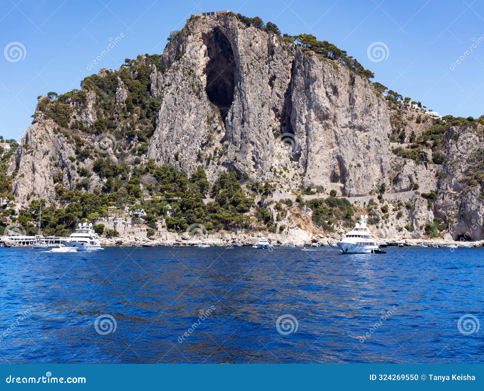 Limestone Cliffs with Natural Arches and Caves of the Capri Island ...