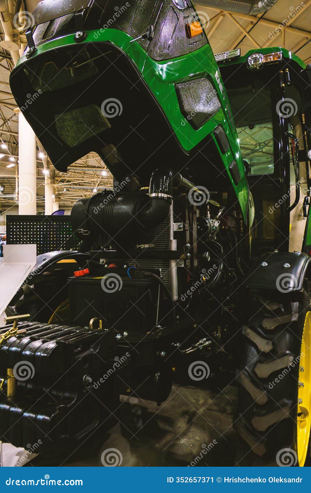 A Close-up View of a Modern Tractor with the Hood Open, Showcasing the ...
