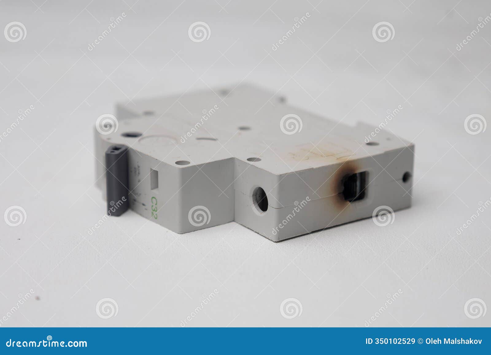 Burned Circuit Breaker Showing Signs of Electrical Overload on White ...