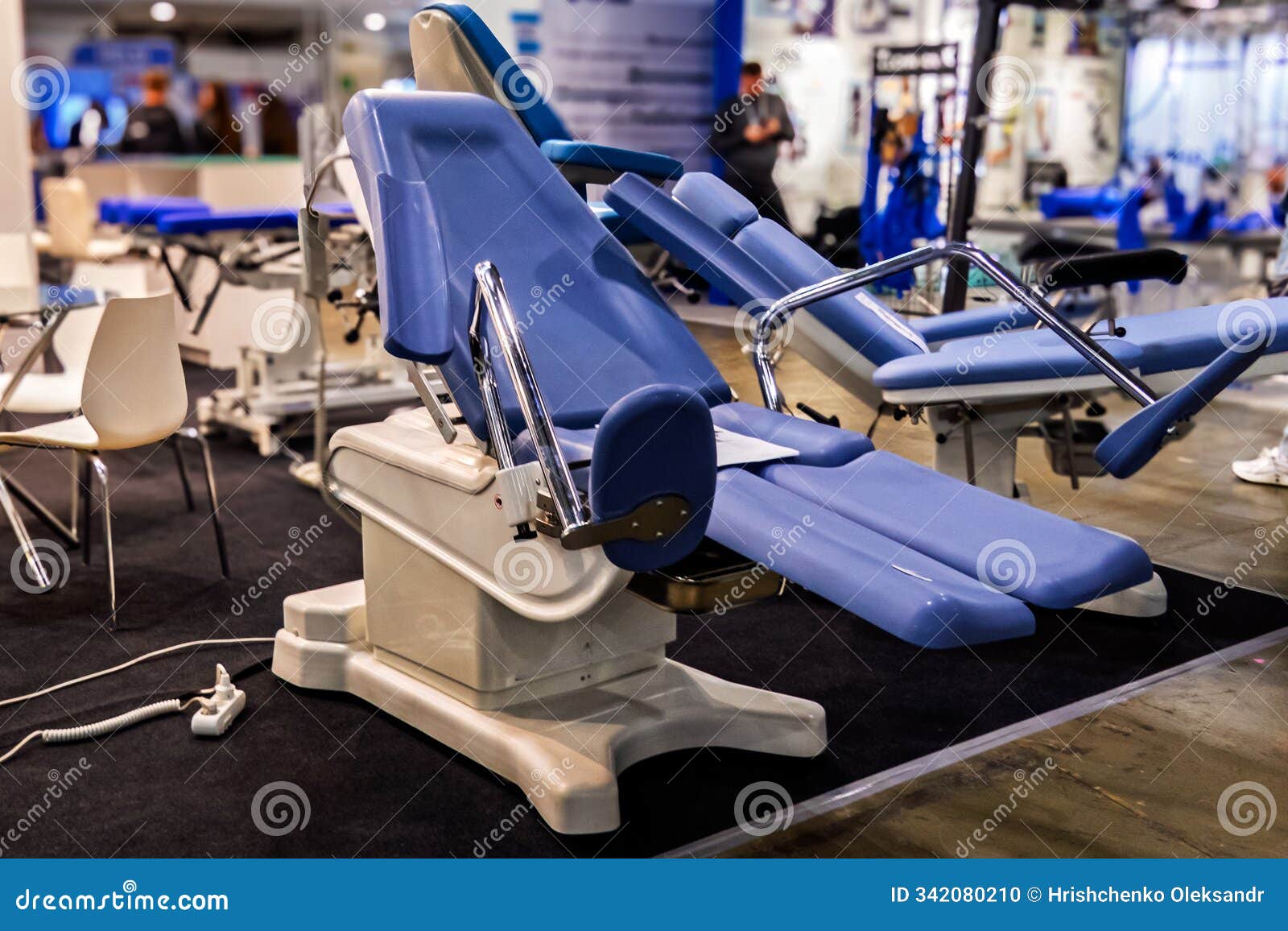 Examination Chair In The Gynecologists Office Background Stock Photo ...