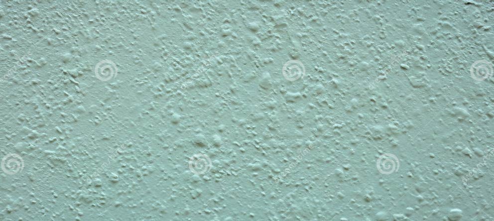 Light Green Textured Wall with Bumps and Paint Drops Providing Copy ...