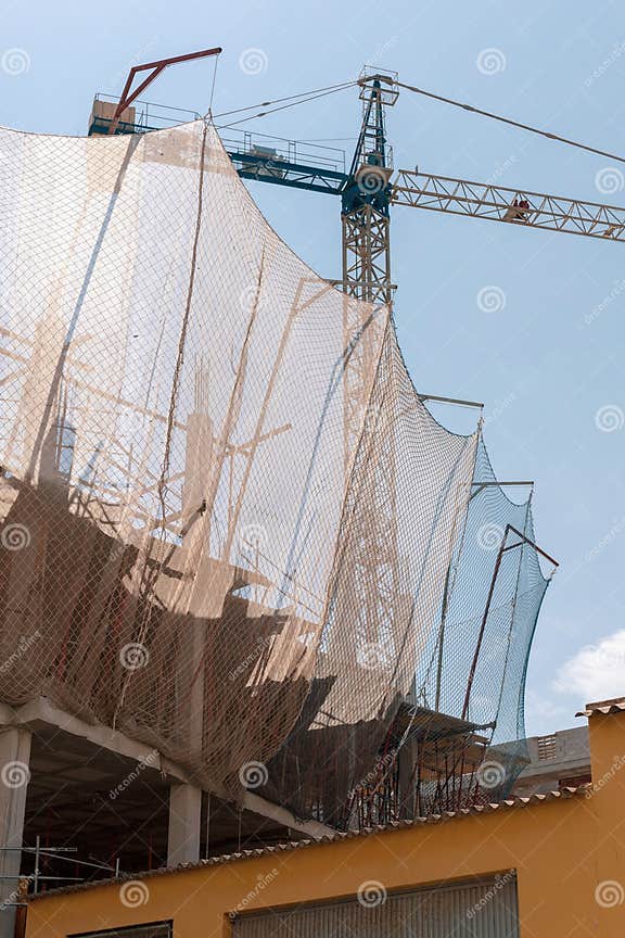 New Building Construction Process. Safety Nets and Structural Beams ...