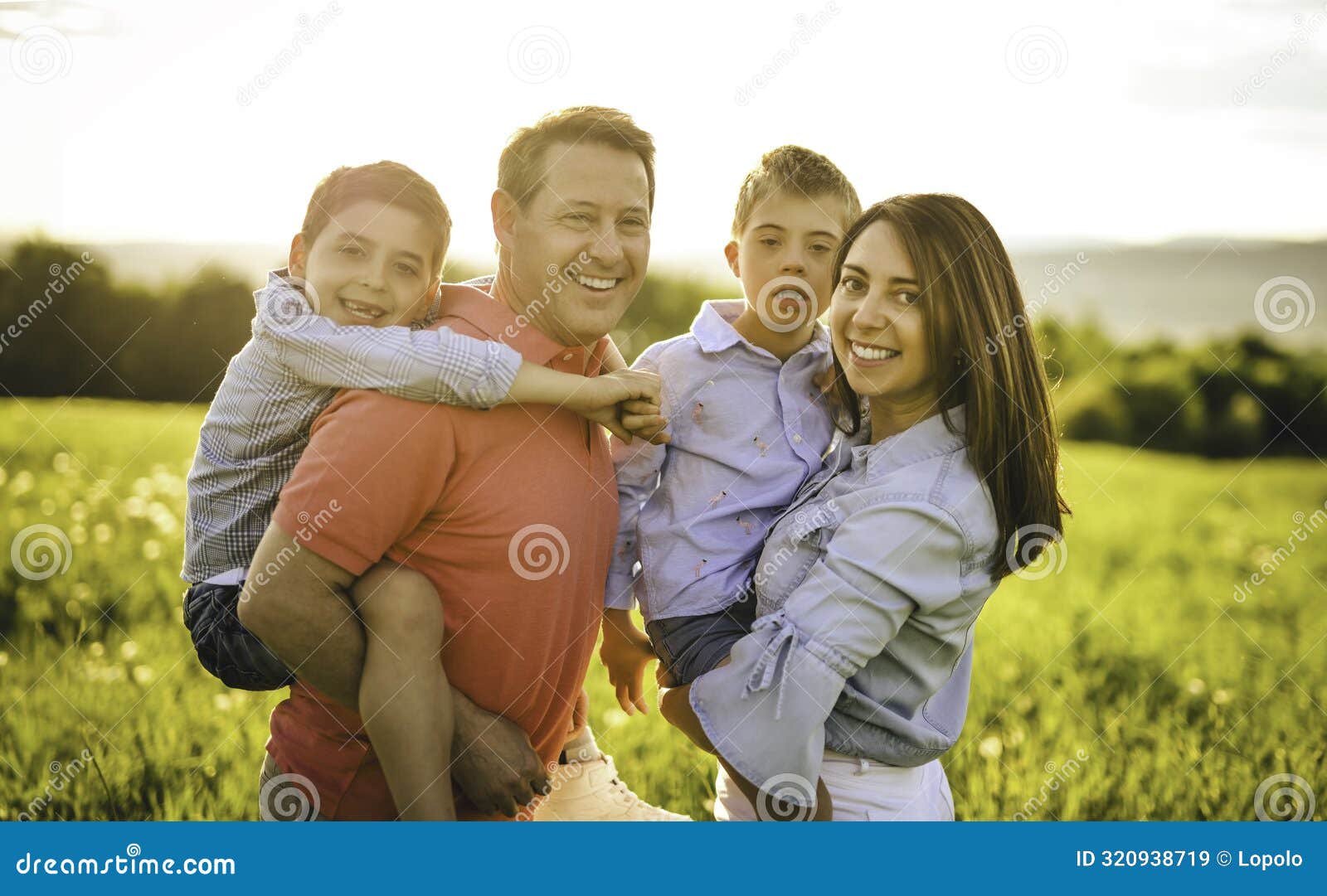 Nice Family Playing on Great Field at Sunset Stock Image - Image of ...