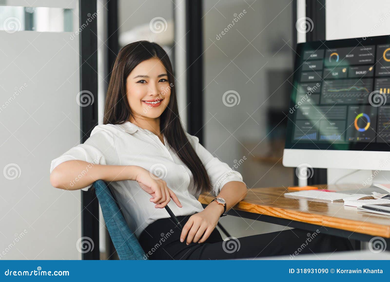 Professional Data Analyst Using Data Visualizations Dashboard On Computer Monitor For Data