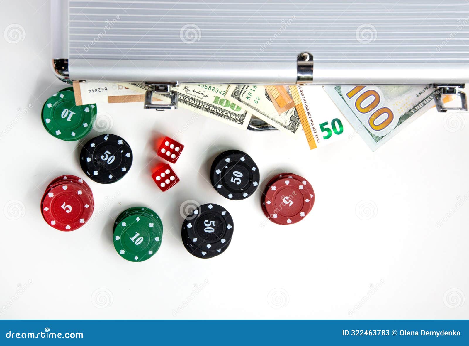 A Silver Case Sits Open Revealing Poker Chips, Dice, and US Dollar ...
