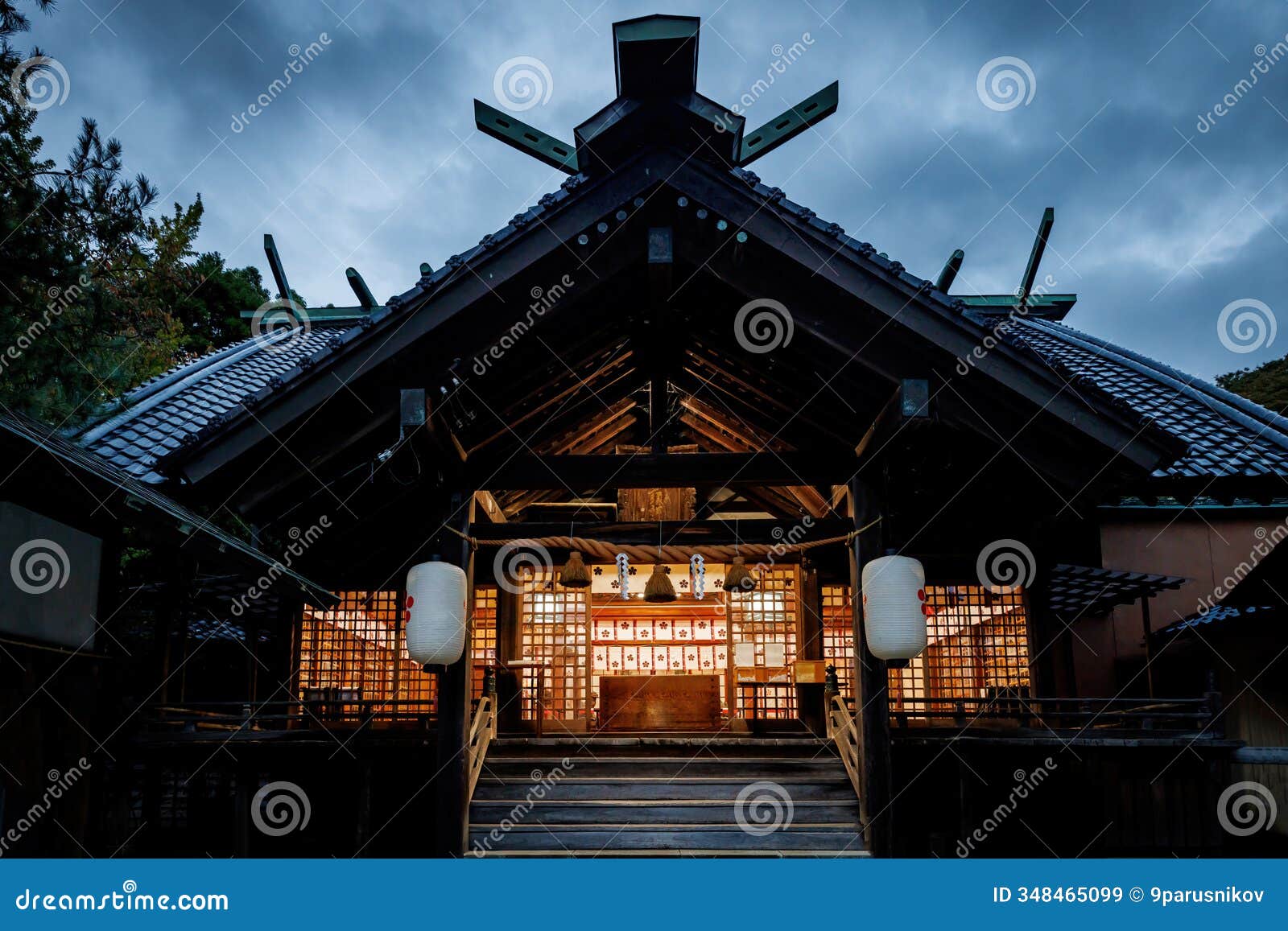 A Stunning View of a Traditional Japanese Temple Illuminated at Dusk ...