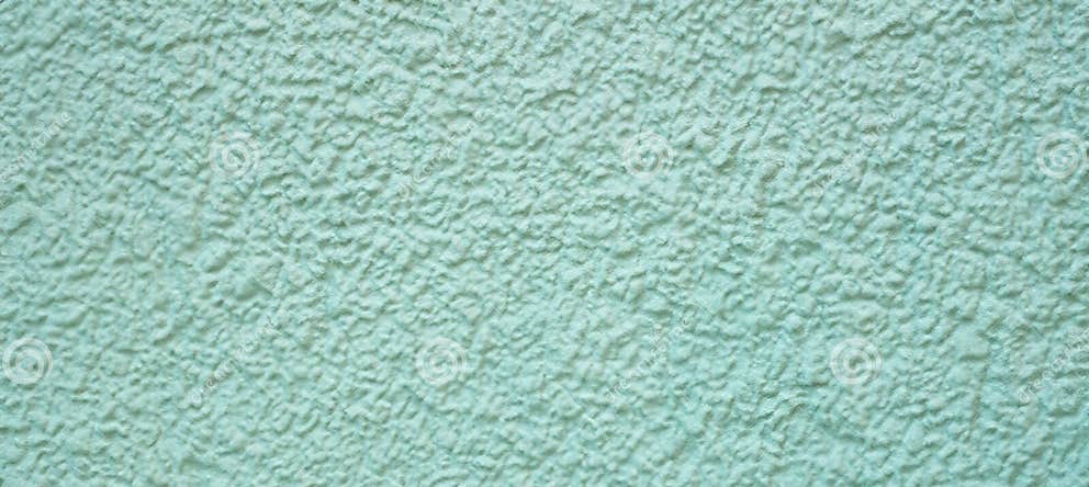 Light Green Textured Plaster Wall is Shown Providing a Background with ...