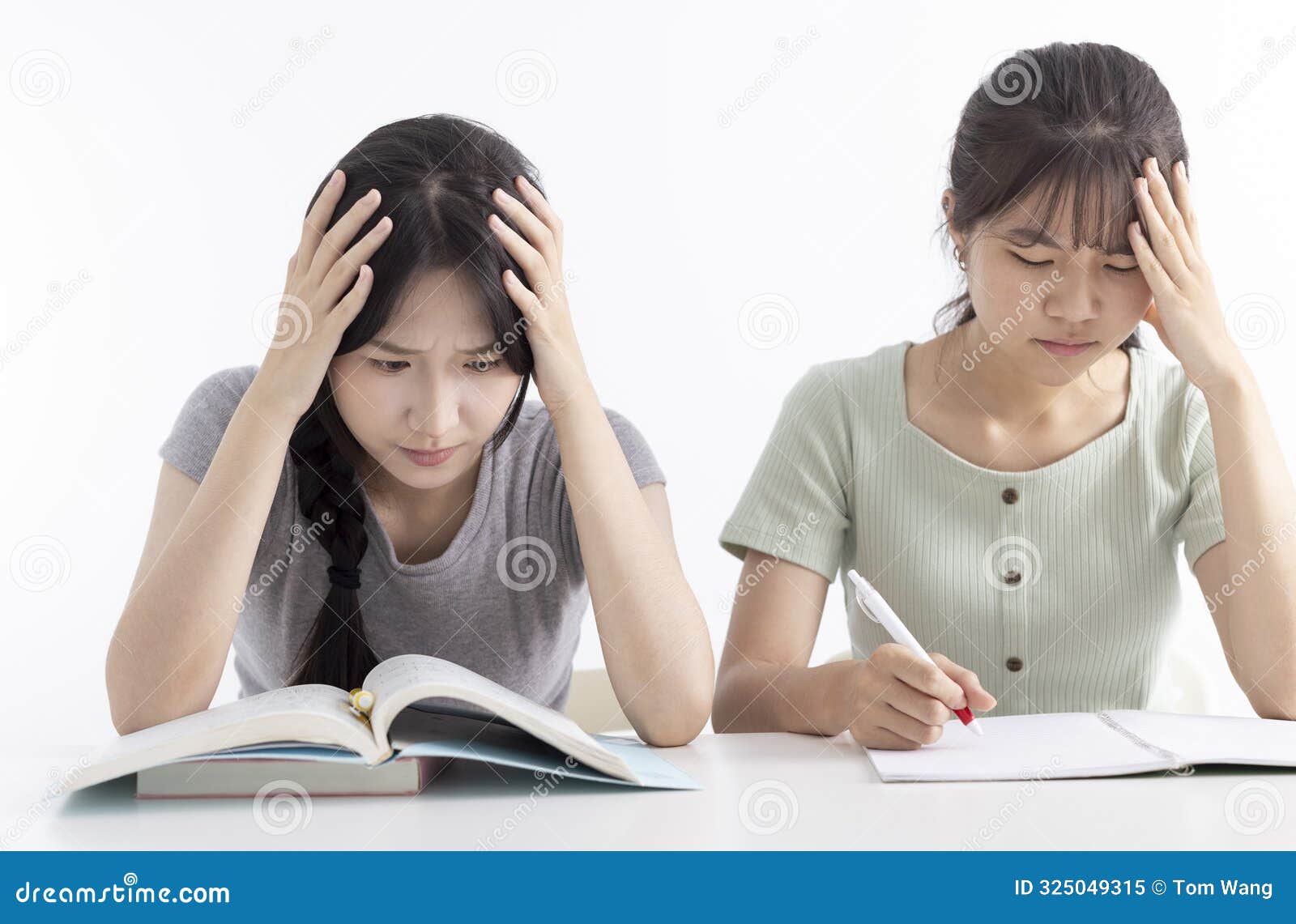 Tired Upset Student Girls Grabbing Head in Classroom Stock Image ...