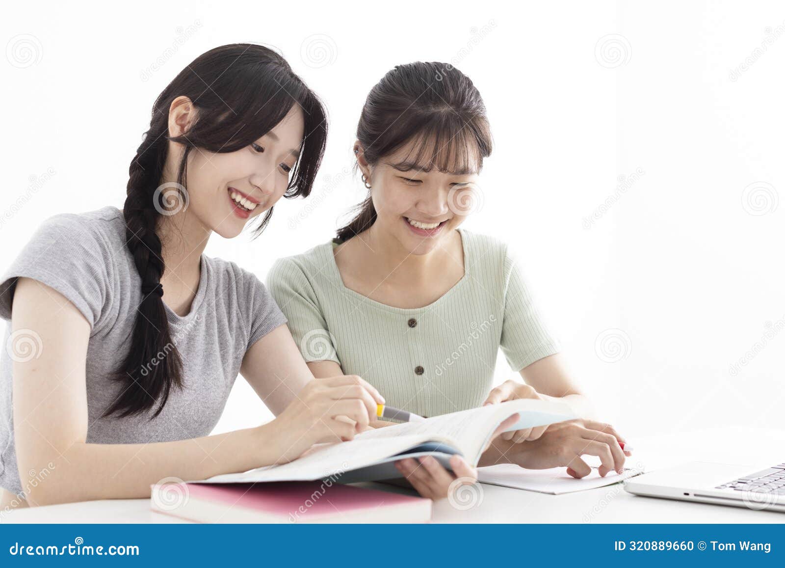 Two Students Doing Homework Together and Helping Each Other Stock Photo ...