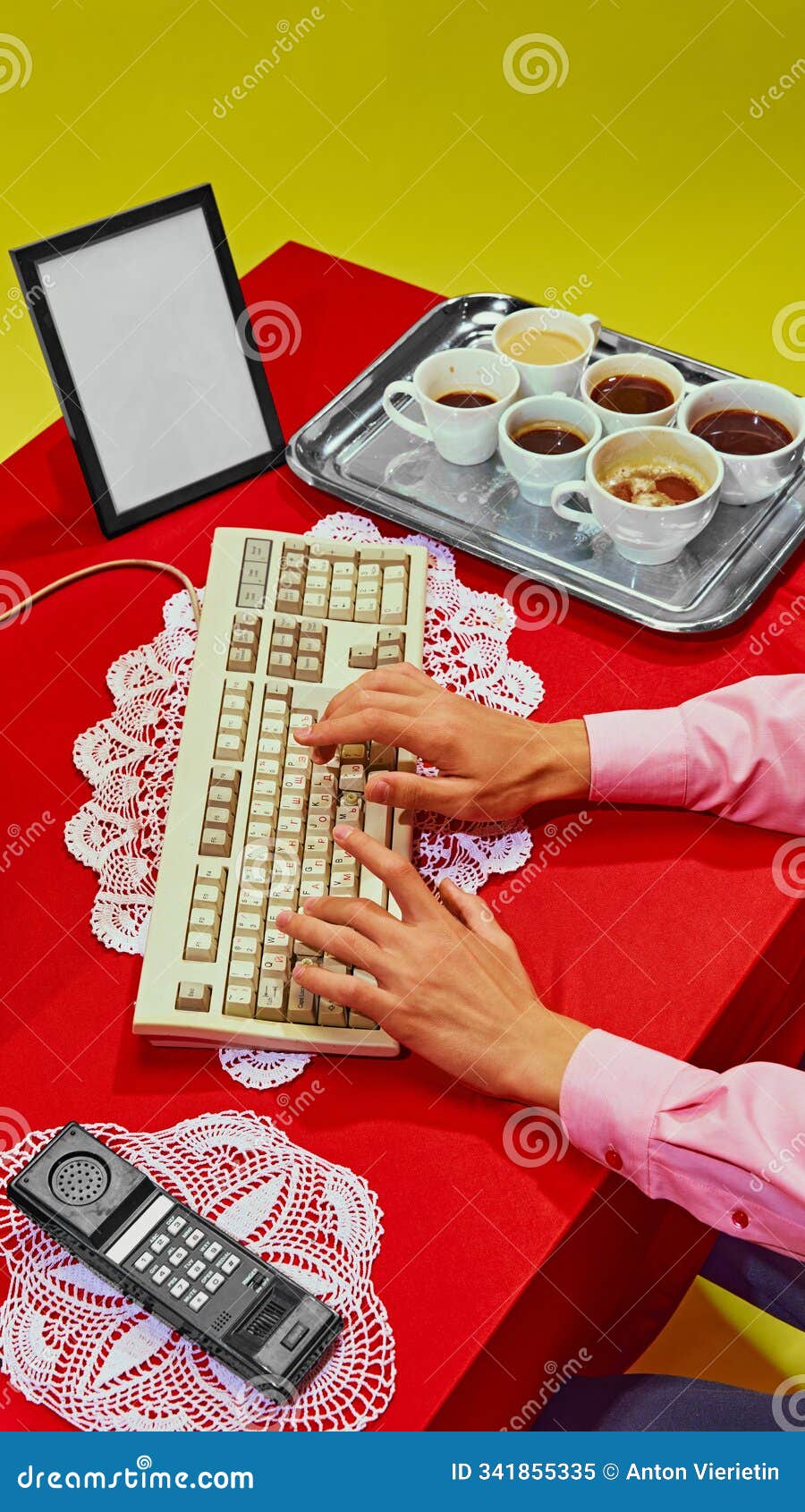 View from Above of Man Typing at Vintage Computer, with Tray of ...