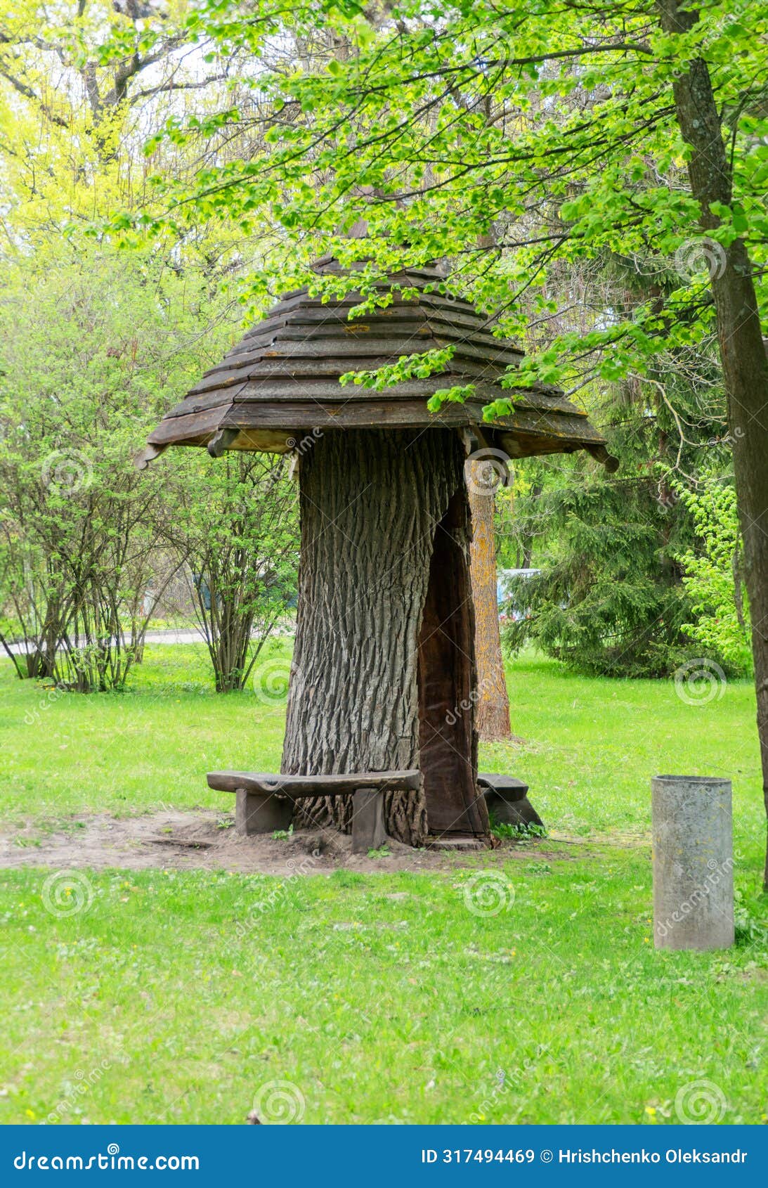 Wooden Gazebo in the Spring Forest Made in a Tree Trunk Stock Image ...