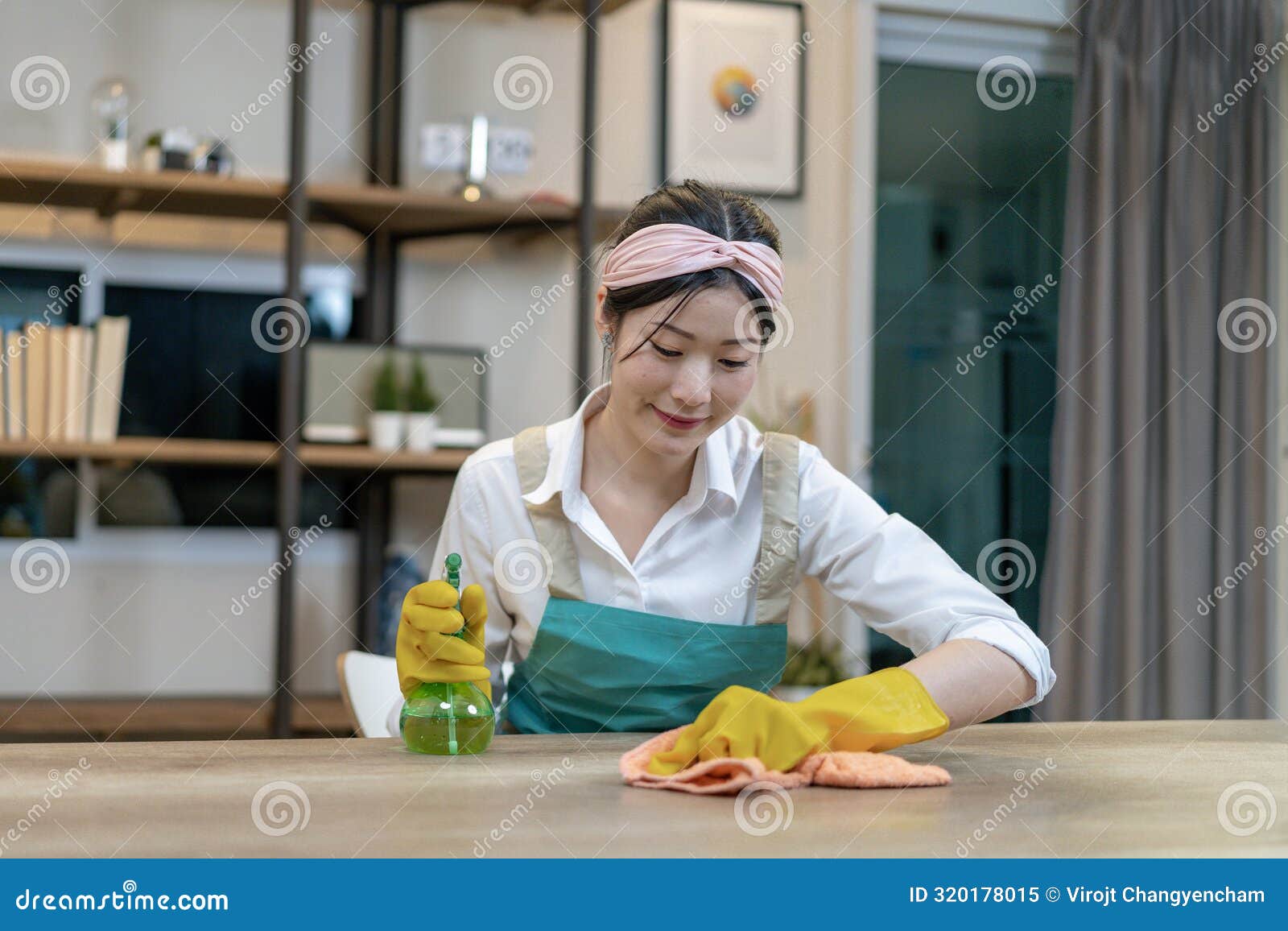The Young Woman is Wiping Cleaning the Table Stock Image - Image of ...