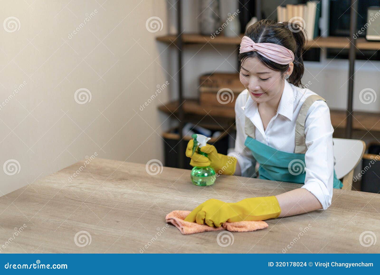 The Young Woman is Wiping Cleaning the Table Stock Photo - Image of ...