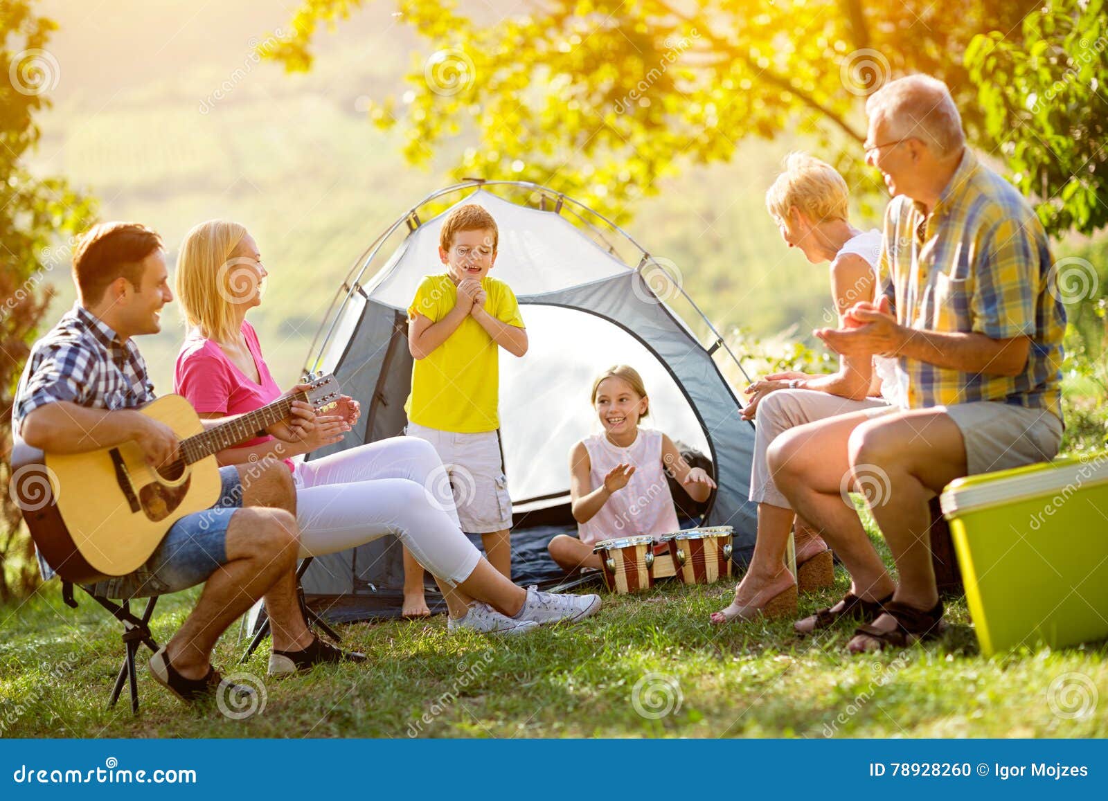 Generation Family Playing a Guitar and Singing Stock Photo - Image of ...