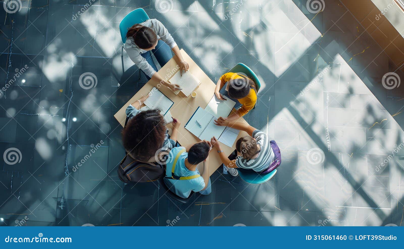 Generative AI Top View of Group of Students Sitting Together at Table ...