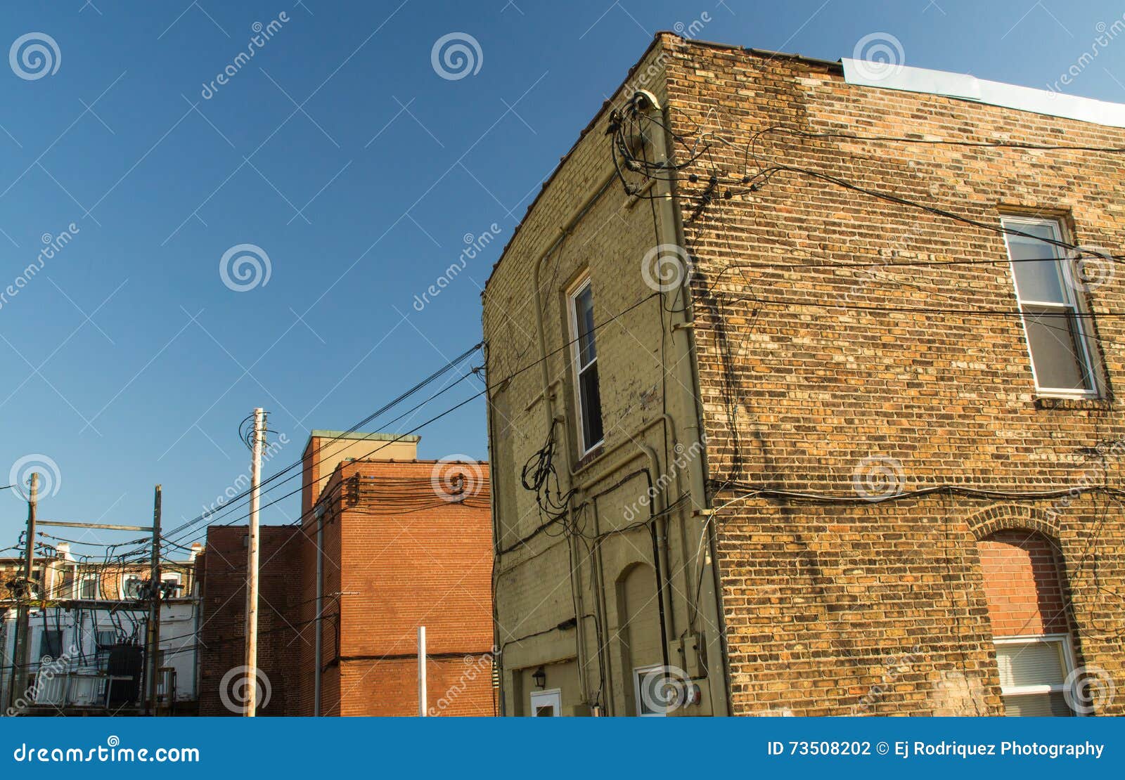 Generic brick buildings. stock photo. Image of light - 73508202