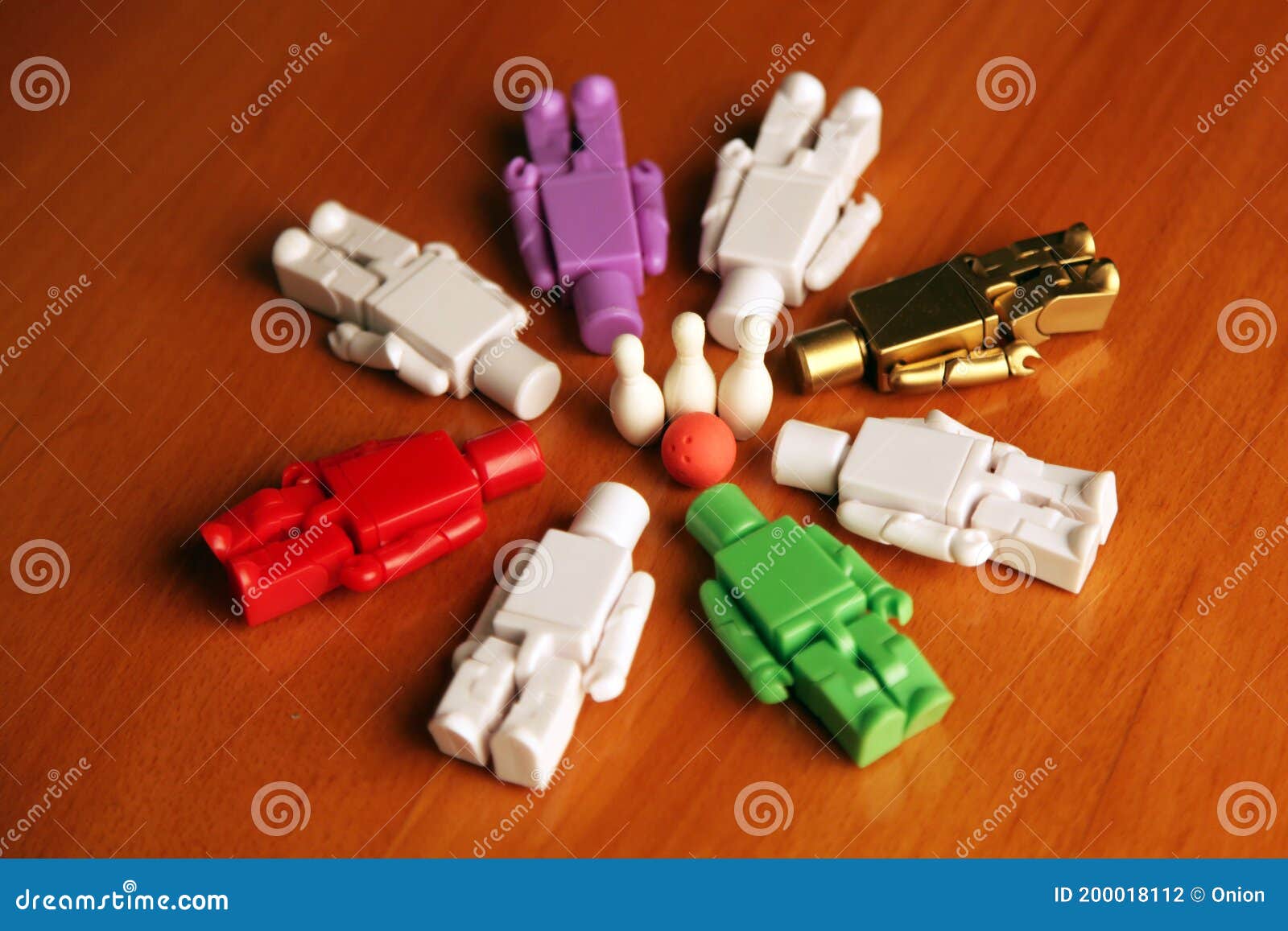 Generic Figures Recreating Lying Down Surrounding Bowling Pins Stock ...