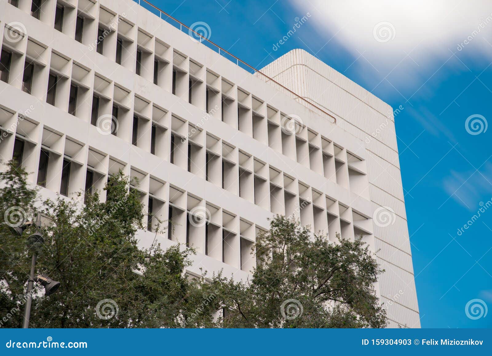 Generic Office Building Structure on a Blue Sky with Trees in ...