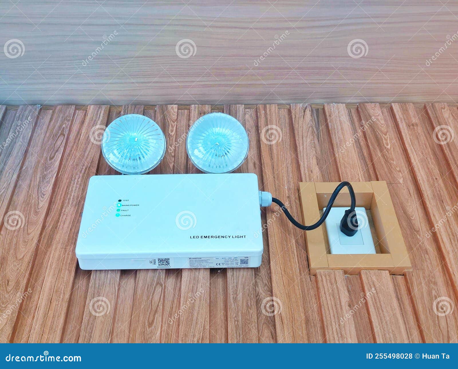 A Generic Wall Mounted LED Emergency Light with 2 Bulbs and Plugged in ...