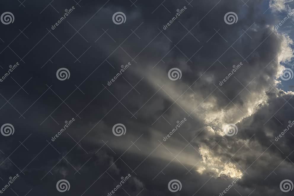 Genesis - Sun Rays Coming through the Clouds Stock Image - Image of ...