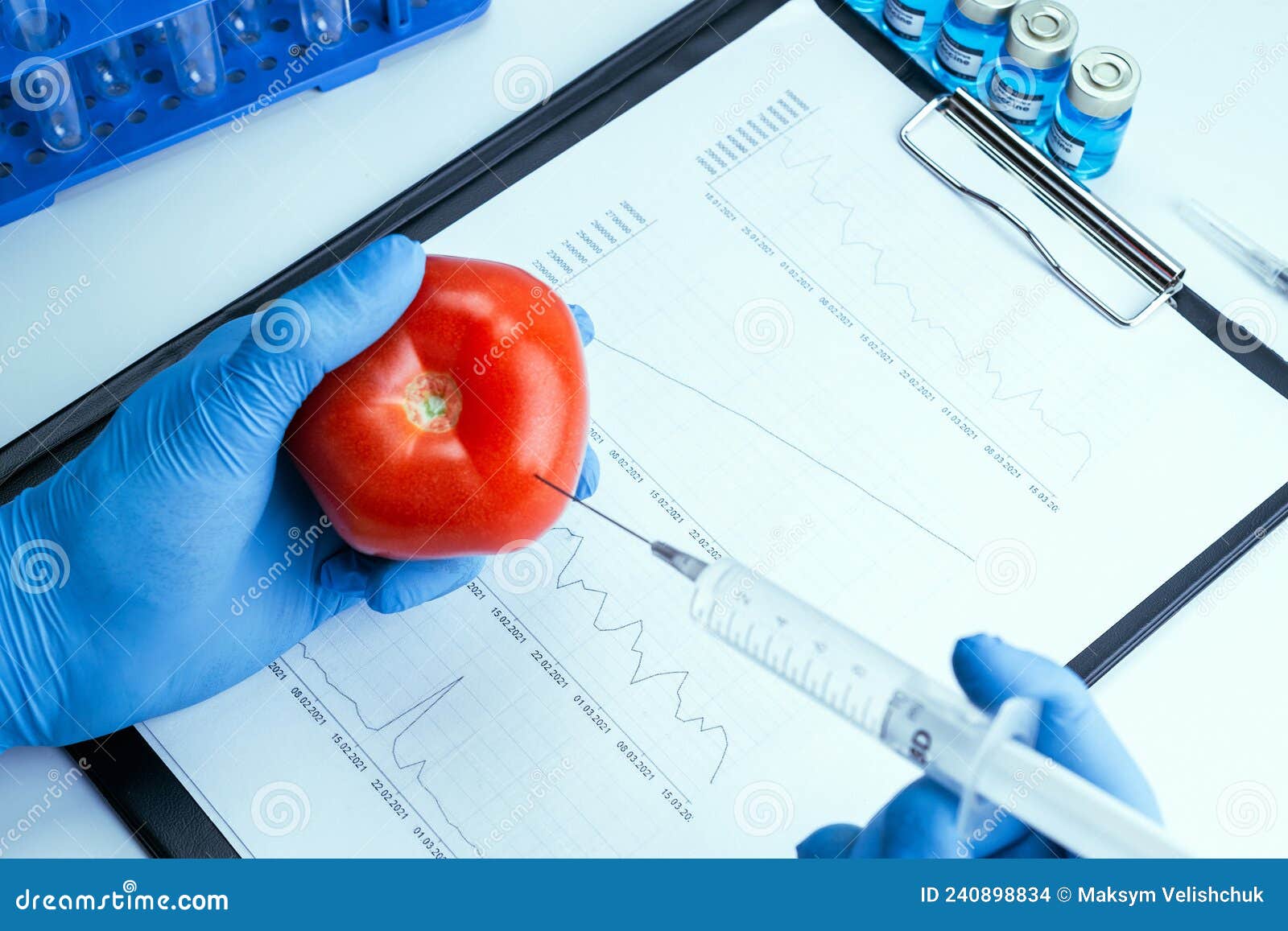 Genetic Modification GMO. Scientist Injecting Liquid from Syringe into ...