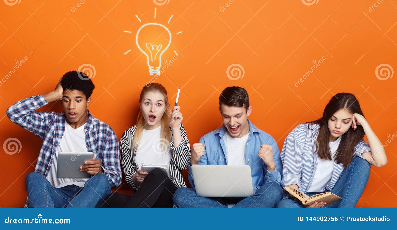 Genius. Students Preparing for Exams Over Studio Background Stock Photo ...