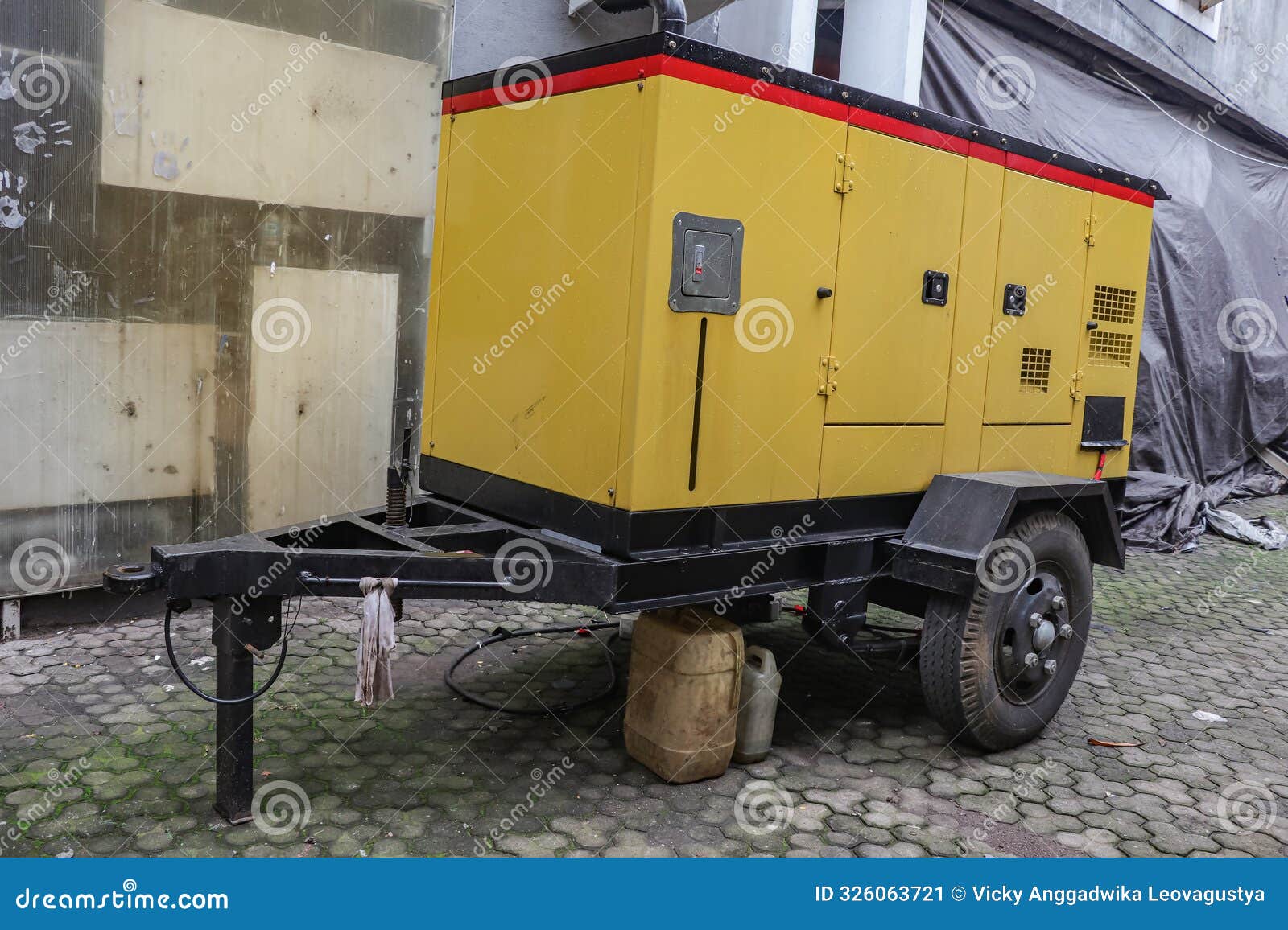 Yellow Portable Electric Generator in the Yard of the Building Complex ...