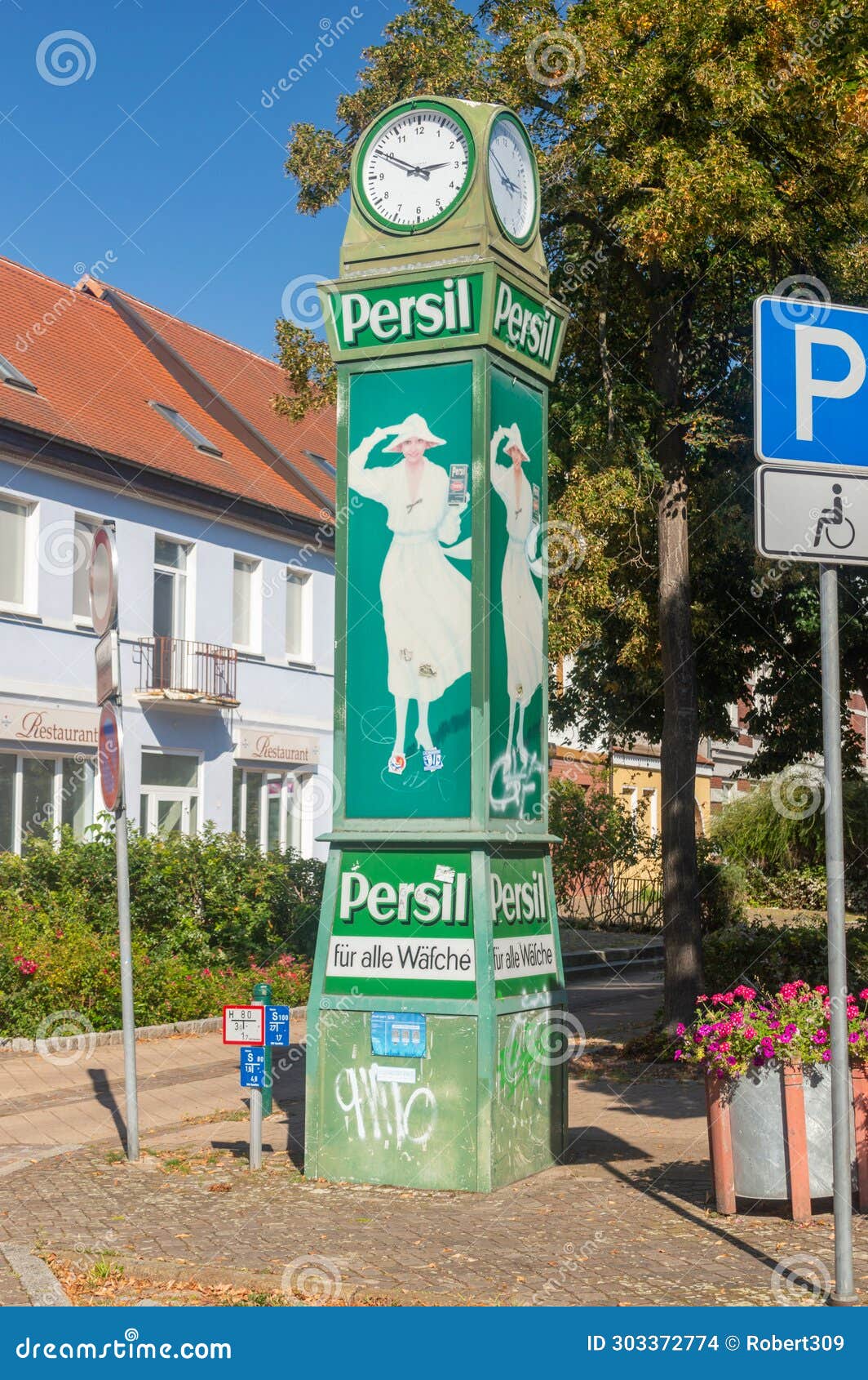 Clock with Persil Advertisement Editorial Stock Image - Image of ...