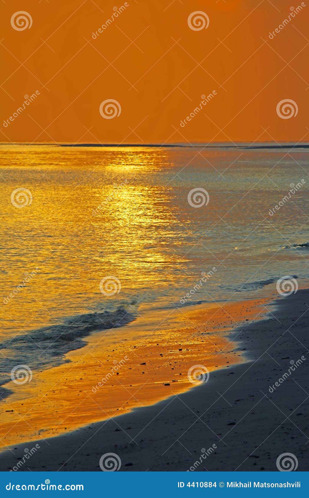 A Gentle Sunset On A Beautiful Sea, The Orange Sun Shines With Its Last ...