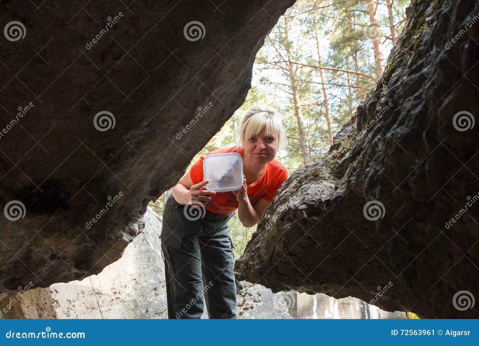 Geocacher finding geocache stock image. Image of sport - 72563961