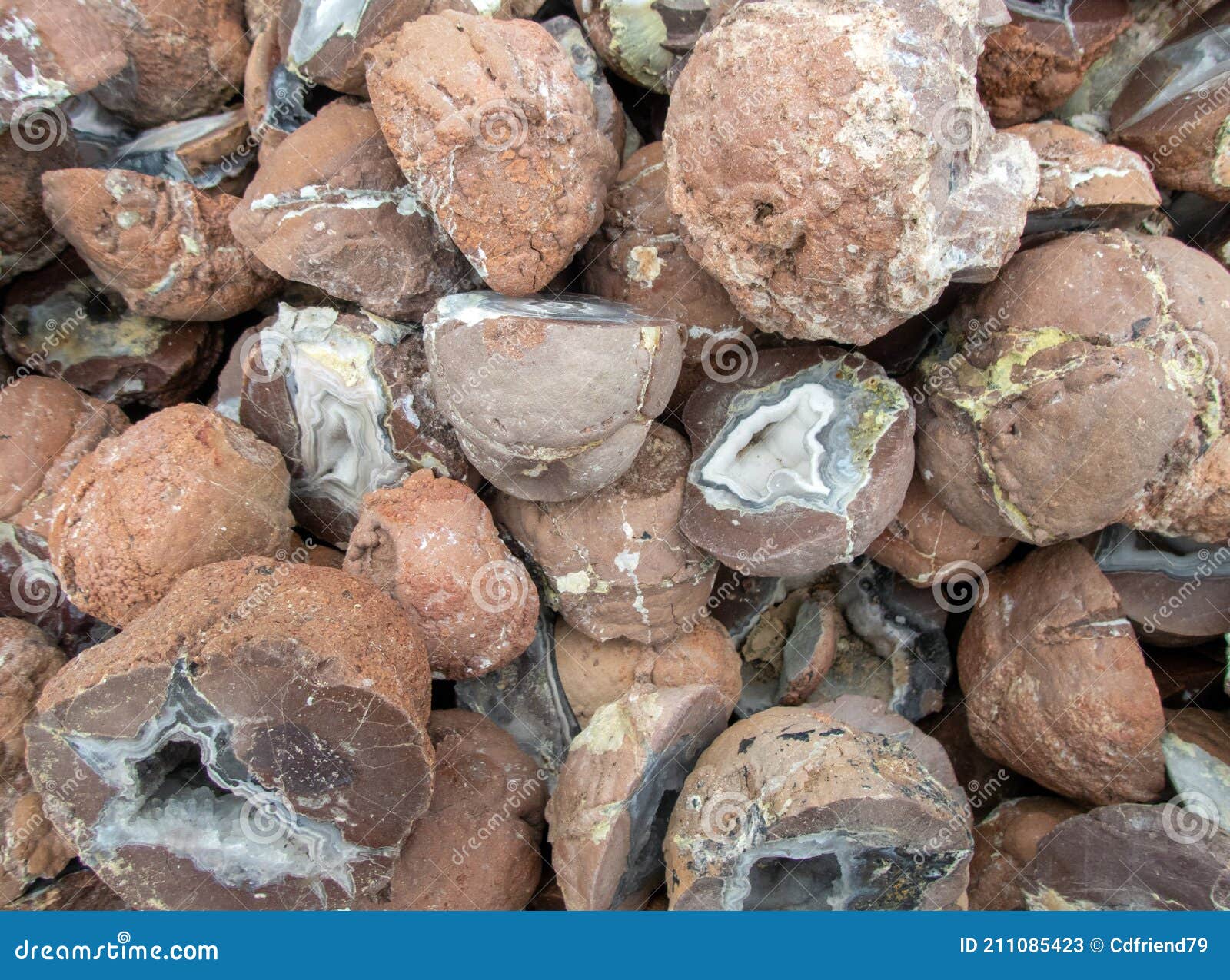 GEode rocks in a big pile. stock image. Image of mineral - 211085423