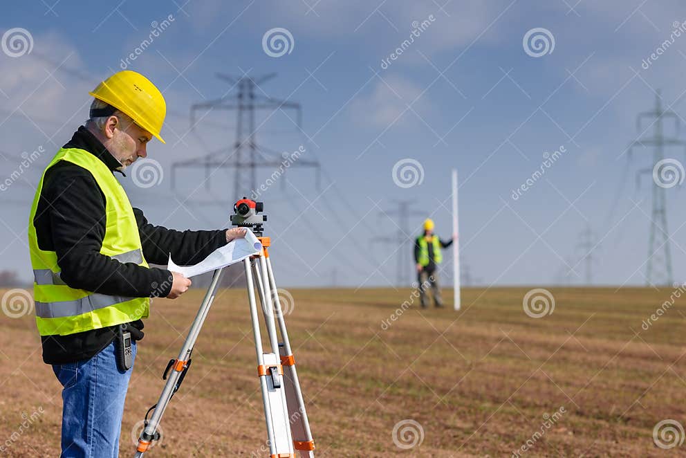 Geodesist Measure Land on Construction Site Stock Image - Image of ...