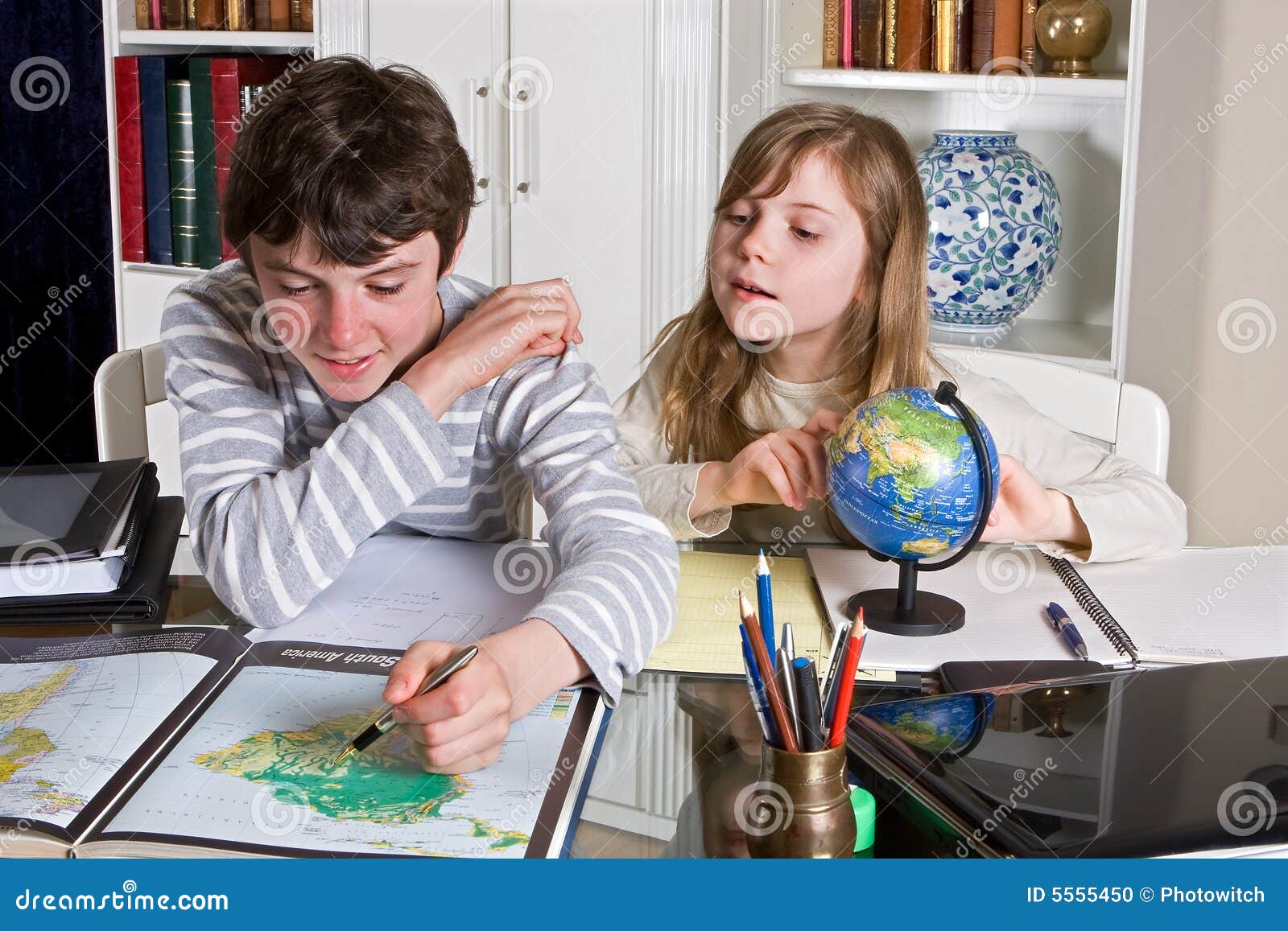 Geography at home stock photo. Image of exam, atlas, learn - 5555450