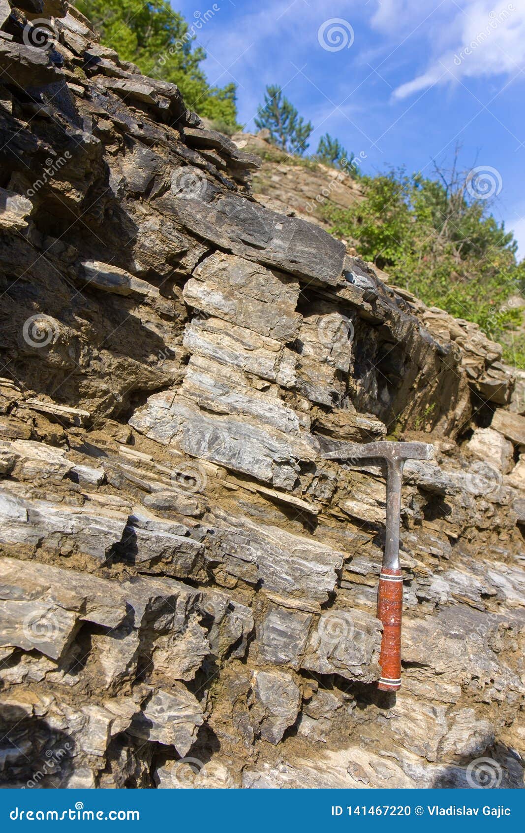 Geological Hammer on the Rocks Stock Photo - Image of limestone ...