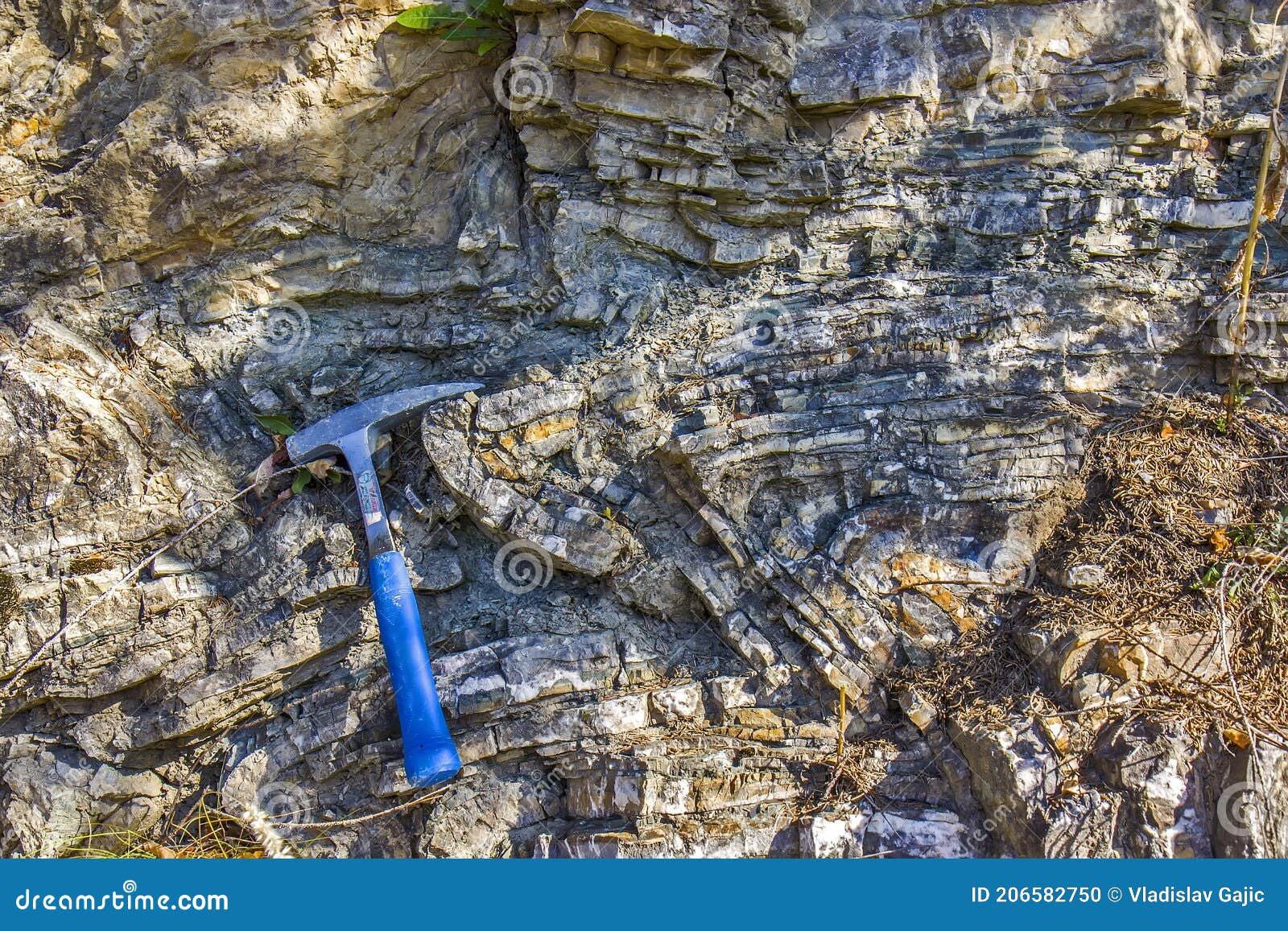 Geological Hammer On The Rocks Stock Photo | CartoonDealer.com #141467220