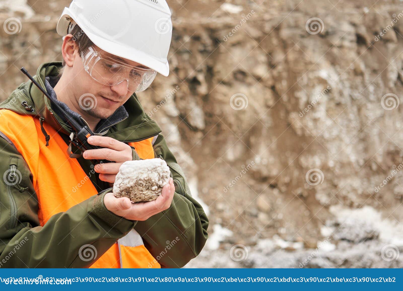 Geologist Examines a Mineral Sample Stock Photo - Image of geologist ...