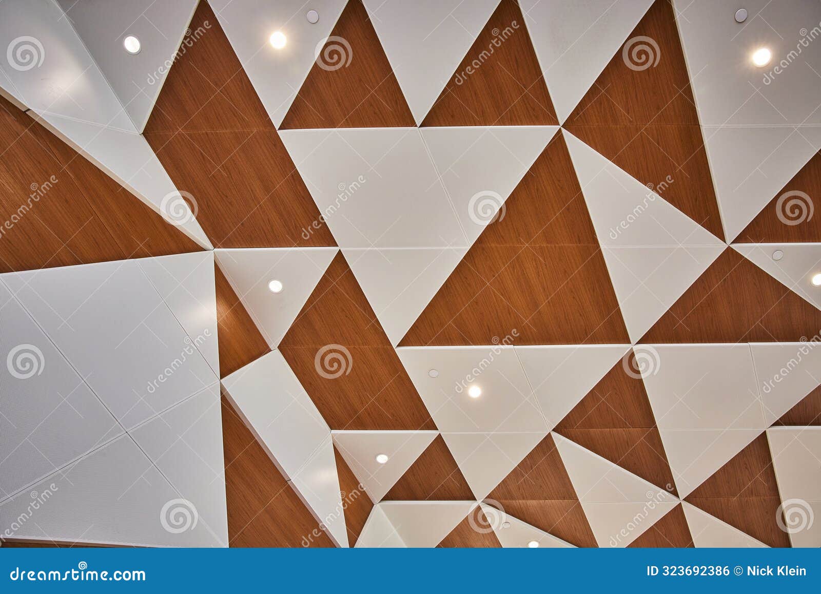 Geometric Ceiling Design with Triangular Panels and Recessed Lighting ...
