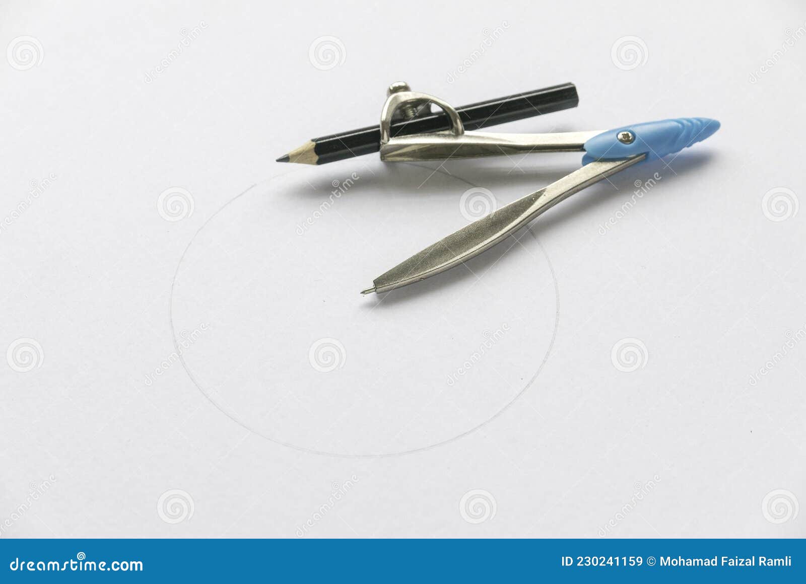 Geometric Compasses Drawing Circle on a White Paper Stock Image - Image ...