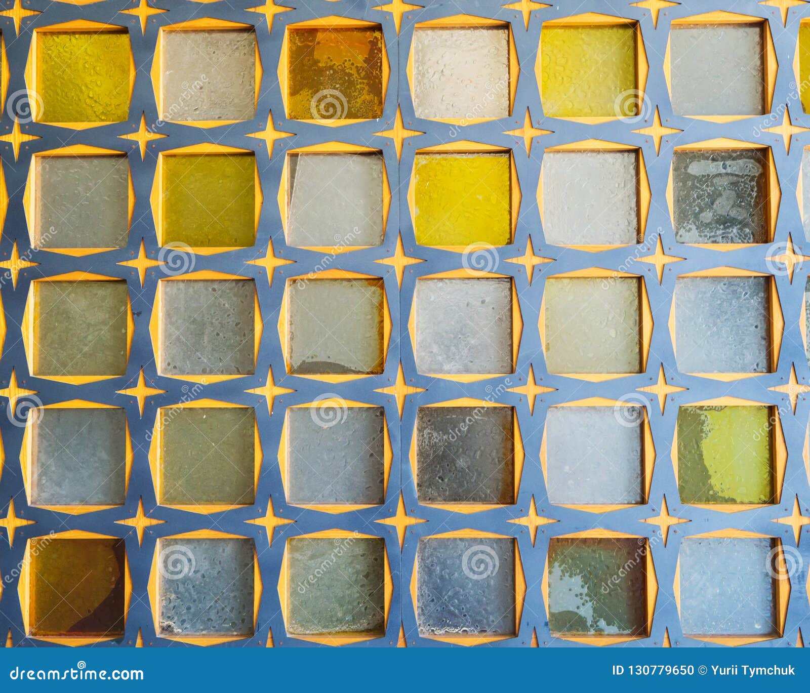 Geometric Pattern. Wall Made of Glass Blocks in Blue-yellow Colors ...